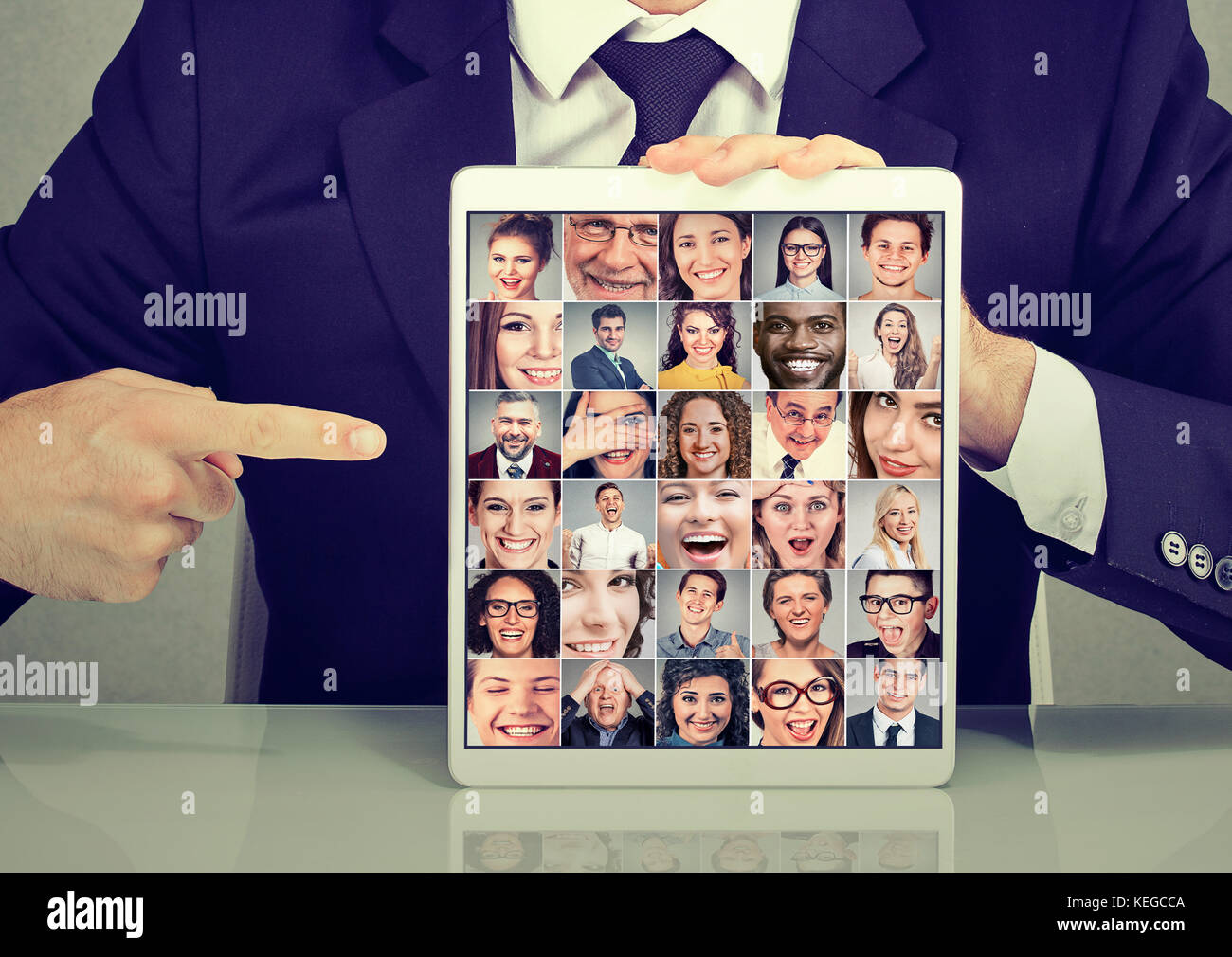 Business man with tablet computer advertising photo collection group of ...