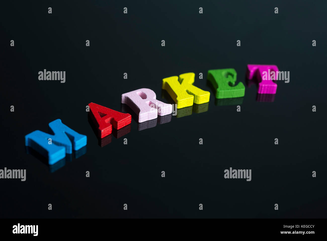 The word market of colored letters on black background Stock Photo - Alamy