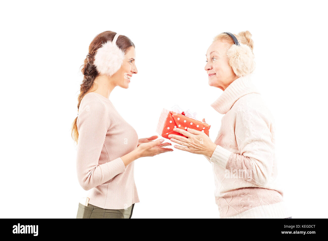 Smiling women exchanging gifts hi-res stock photography and images - Alamy