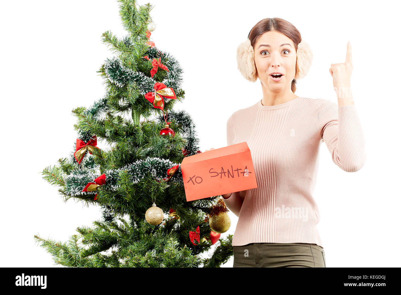 Portrait near Christmas tree Stock Photo - Alamy