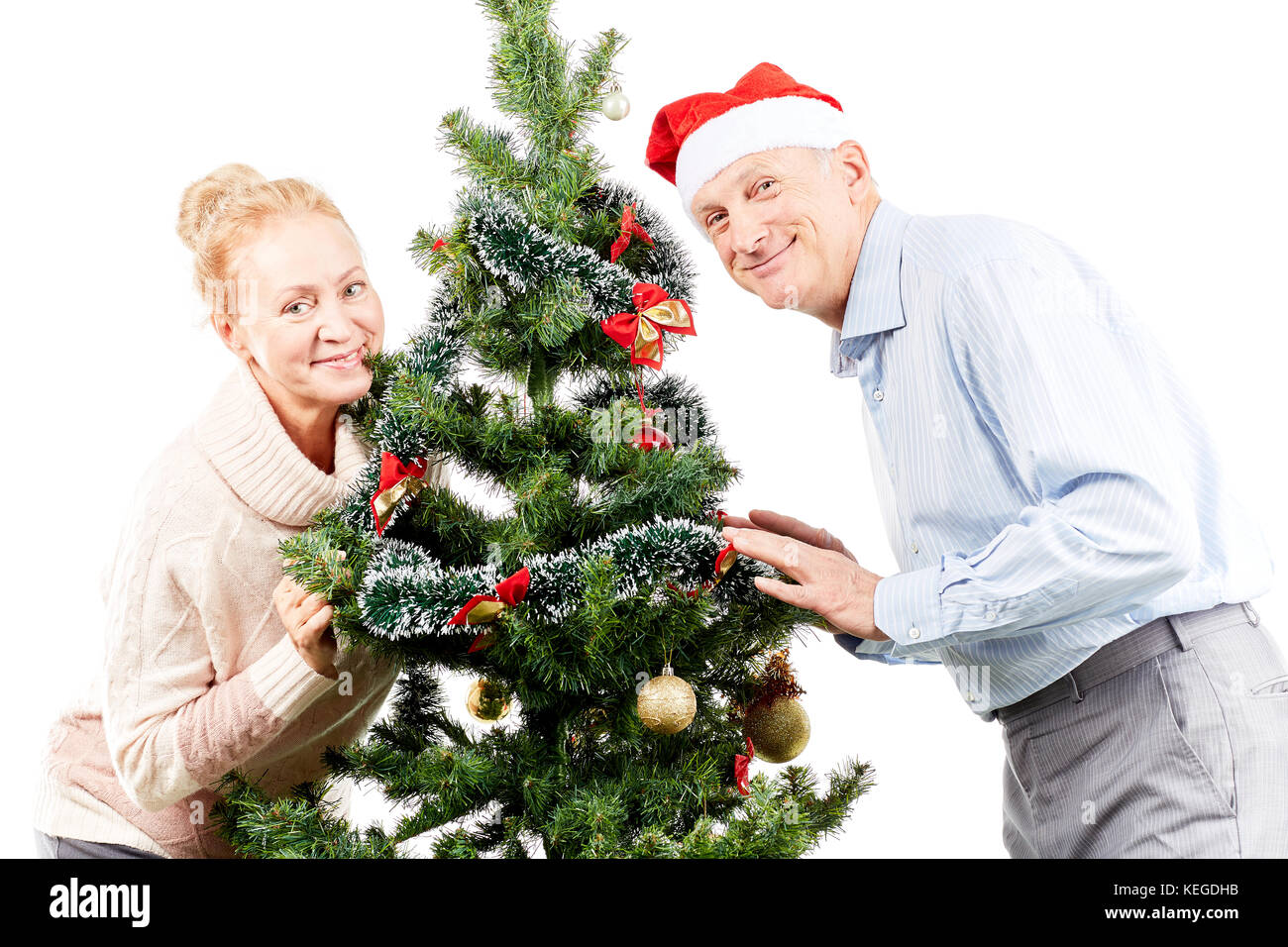 Portrait near Christmas tree Stock Photo - Alamy