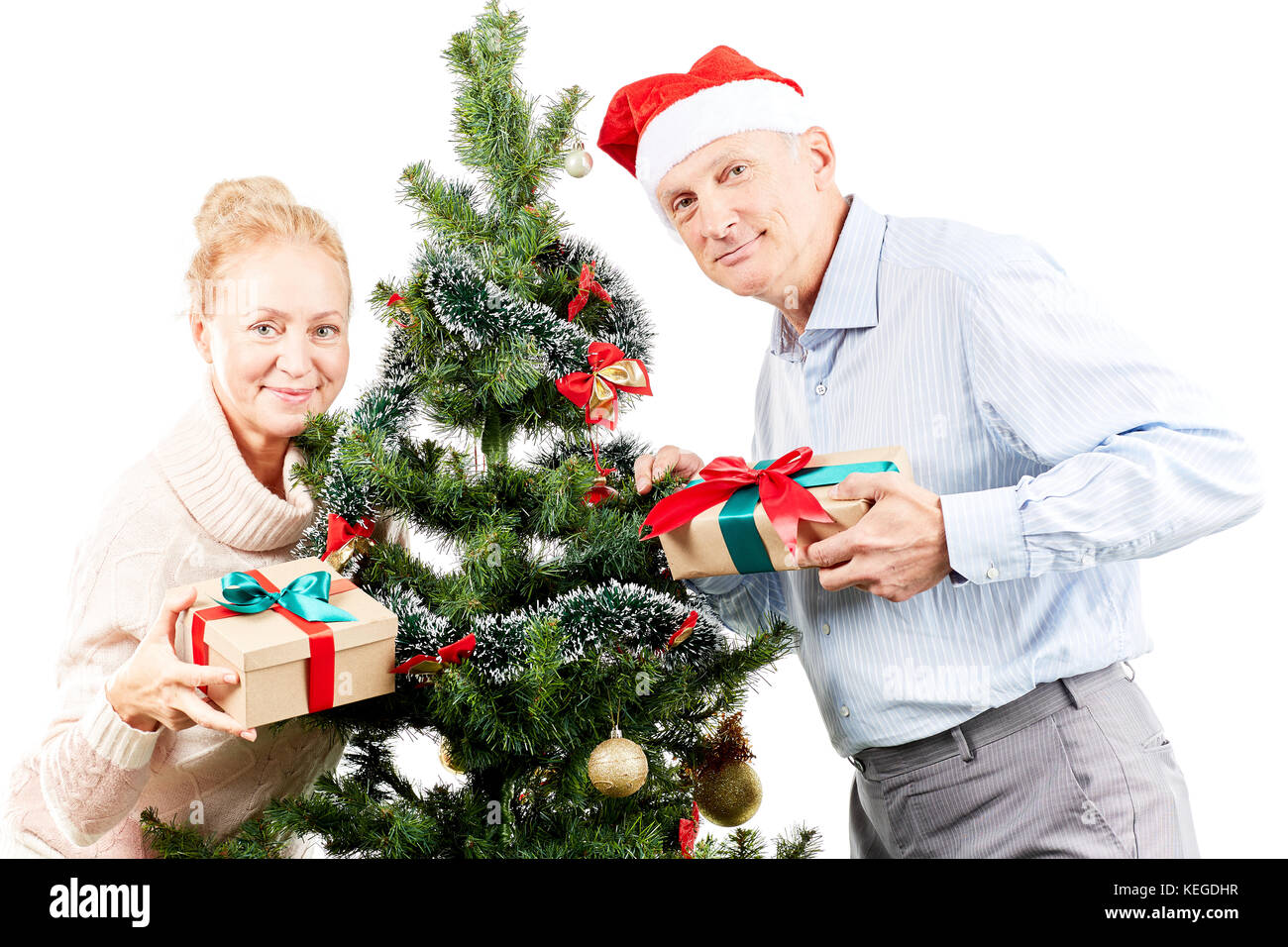 Portrait near Christmas tree Stock Photo - Alamy