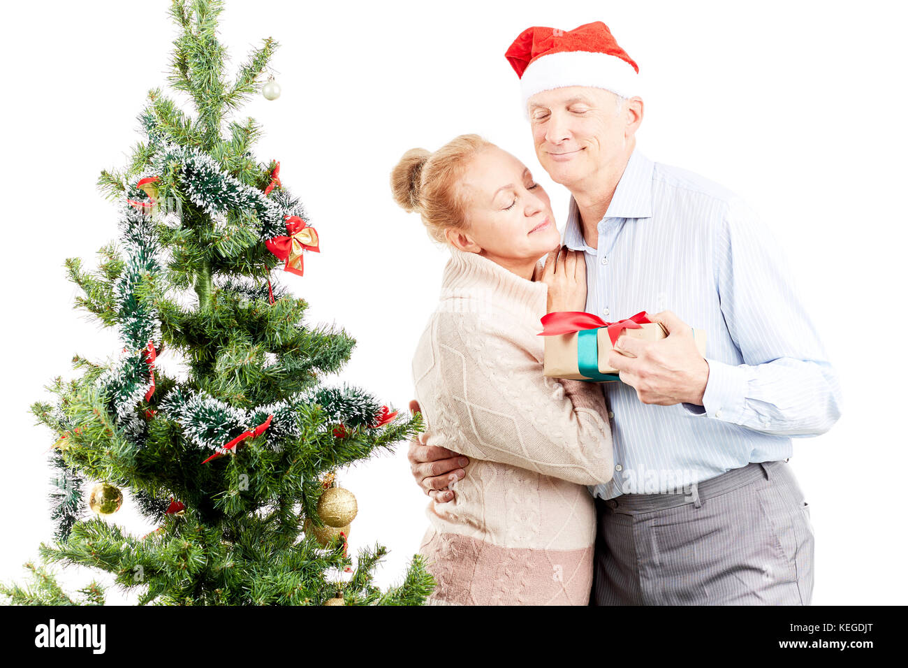 Portrait near Christmas tree Stock Photo - Alamy