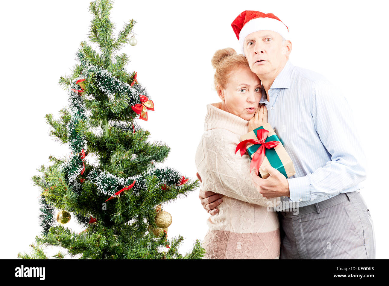 Portrait near Christmas tree Stock Photo - Alamy