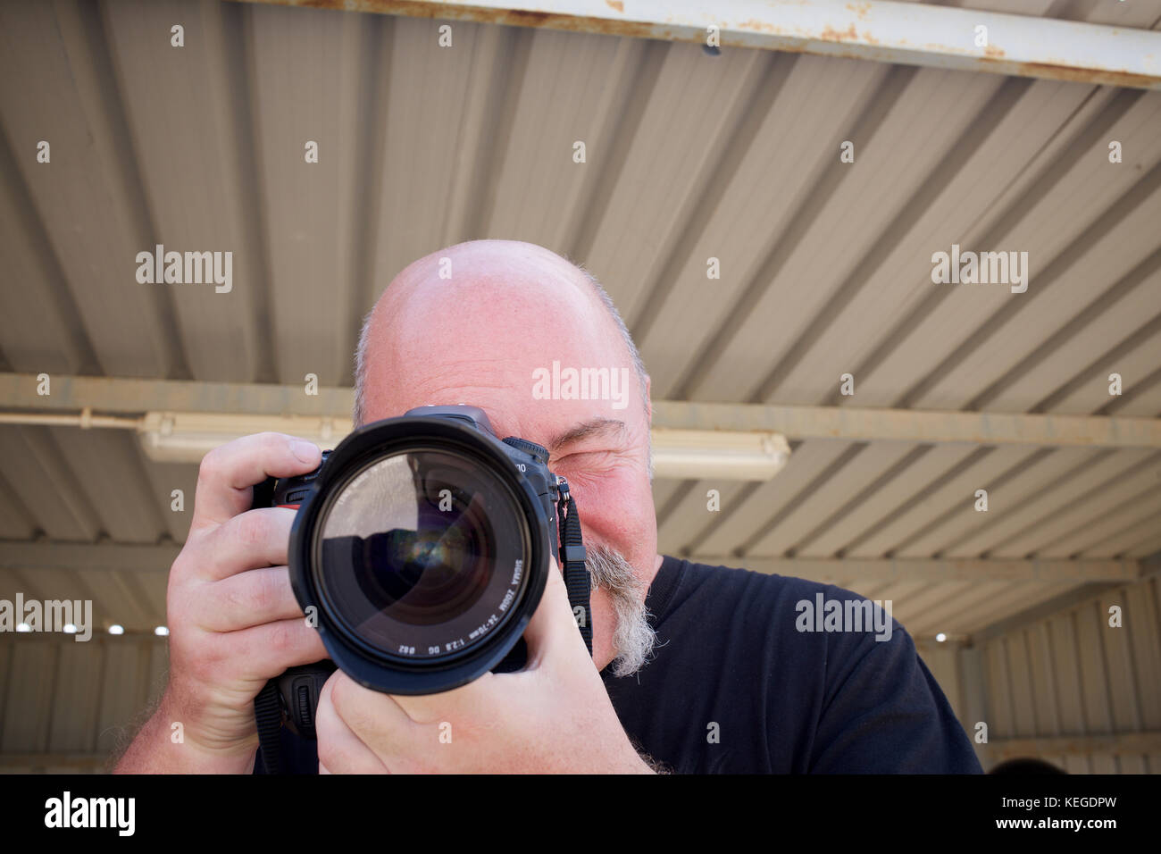 Close up of an older man with a camera to his eye Stock Photo - Alamy