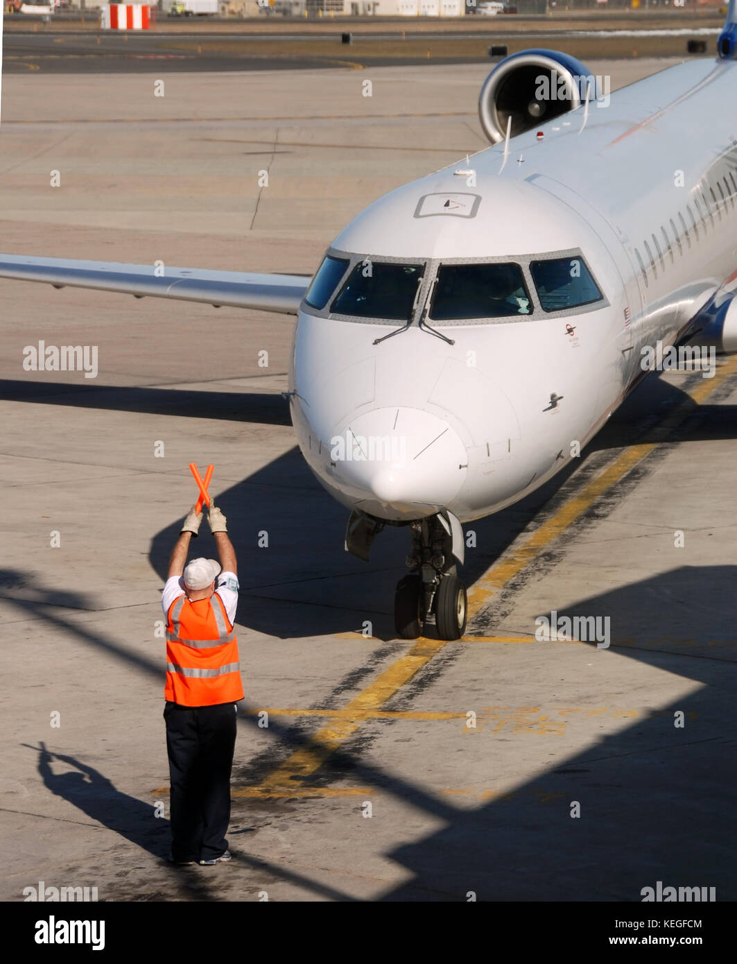 Airplane receiving directions to terminal Stock Photo - Alamy