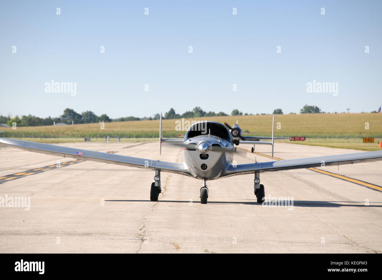 Retro style silver airplane front view Stock Photo - Alamy