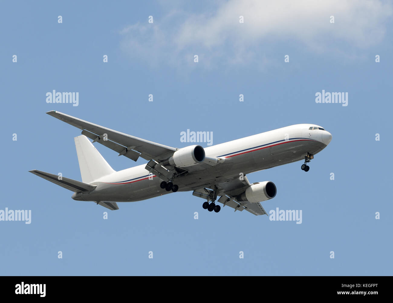 Big cargo carrying airplane in flight Stock Photo - Alamy