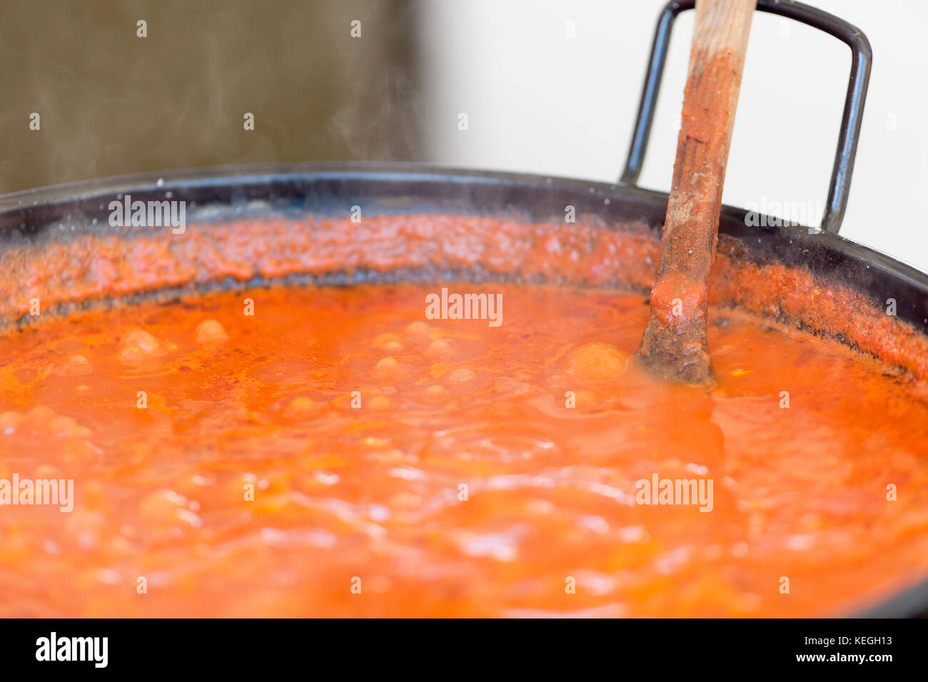 Close-up of a frying pan with food boiling. horizontal shot with ...
