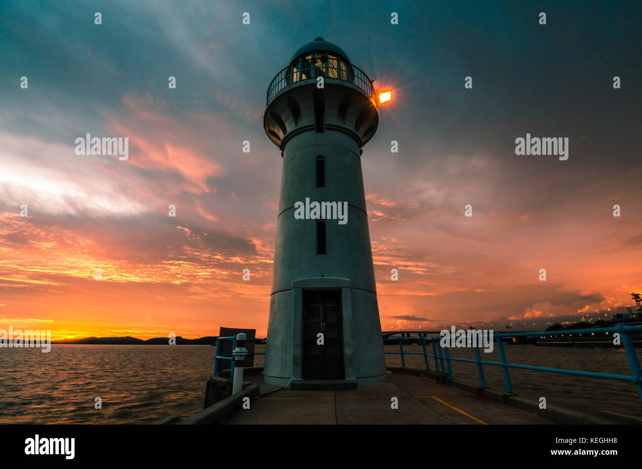 Raffles Marina Lighthouse soak in the expanse of the beautiful sunset ...