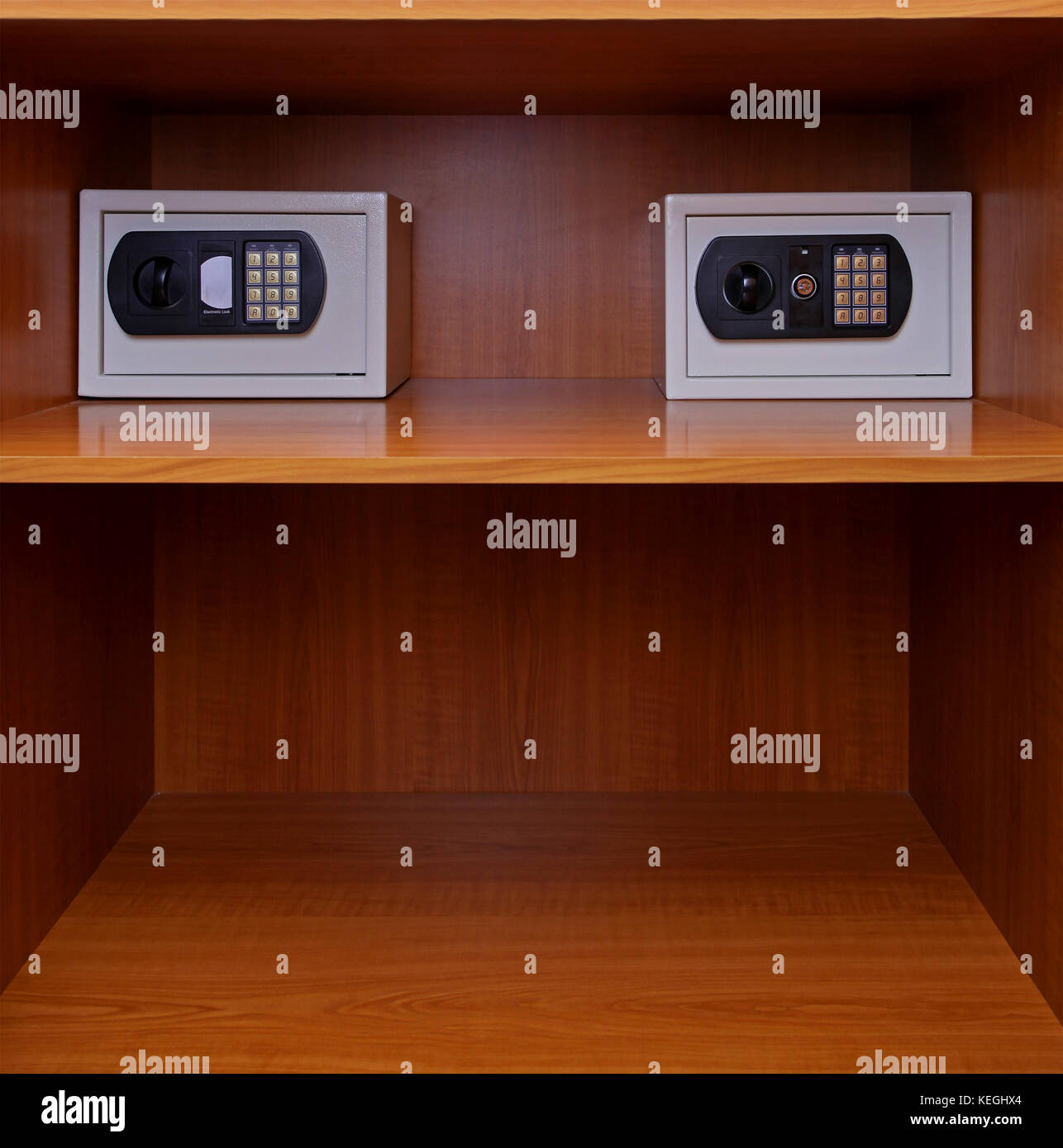 Small closed security safes inside wooden closet Stock Photo - Alamy