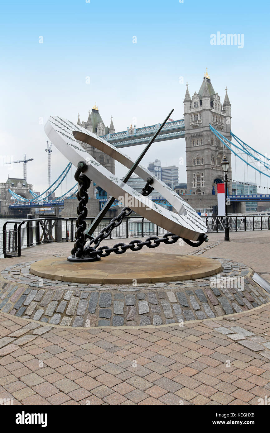 Famous London landmark on Thames river with sun clock Stock Photo - Alamy