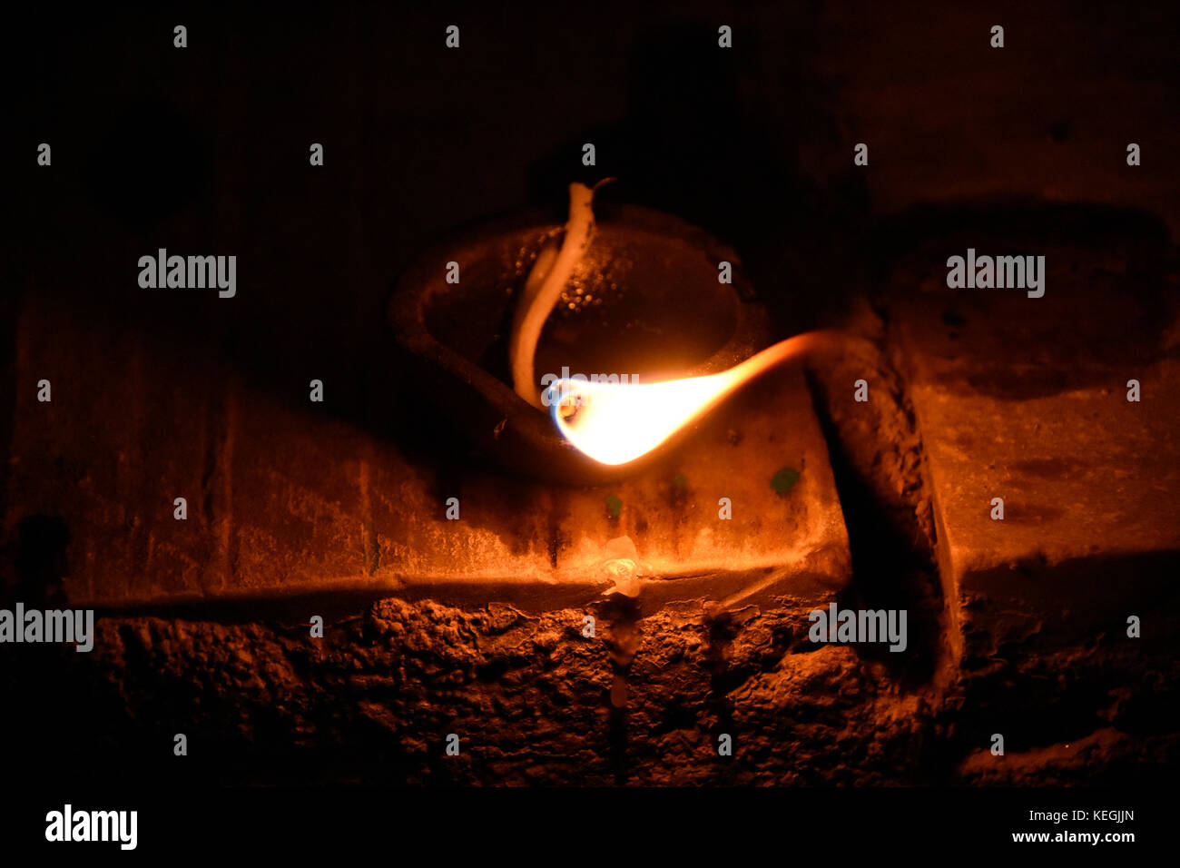 Flame from a bowl of Oil Stock Photo - Alamy