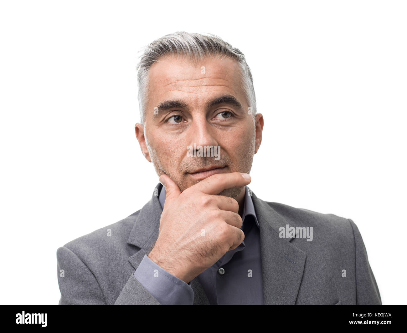 Mature businessman thinking hi-res stock photography and images - Alamy