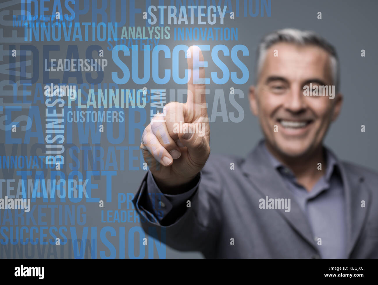 Successful smiling businessman using a virtual touch screen interface ... Successful smiling businessman using a virtual touch screen interface ...