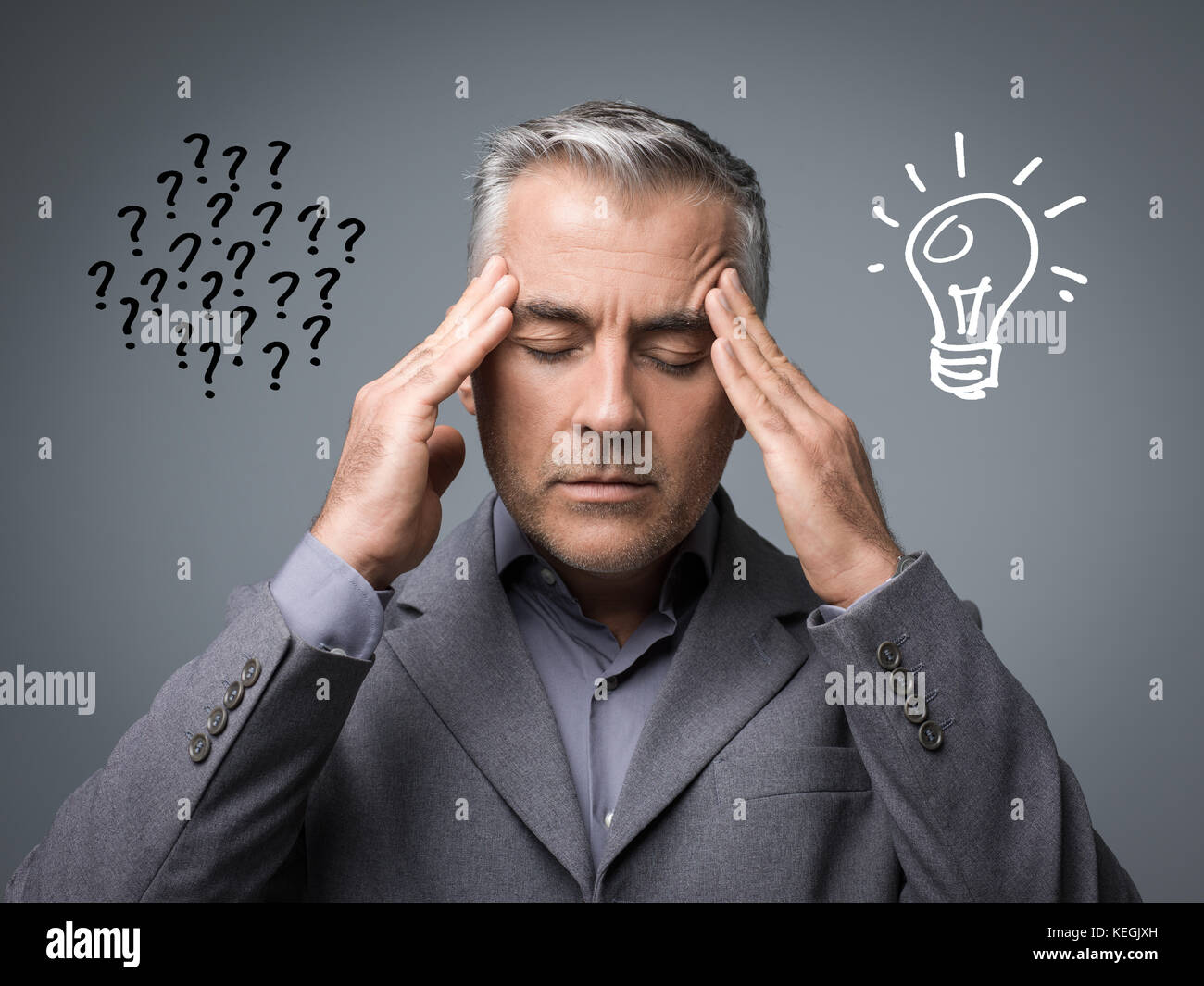 Man thinking question marks hi-res stock photography and images - Alamy