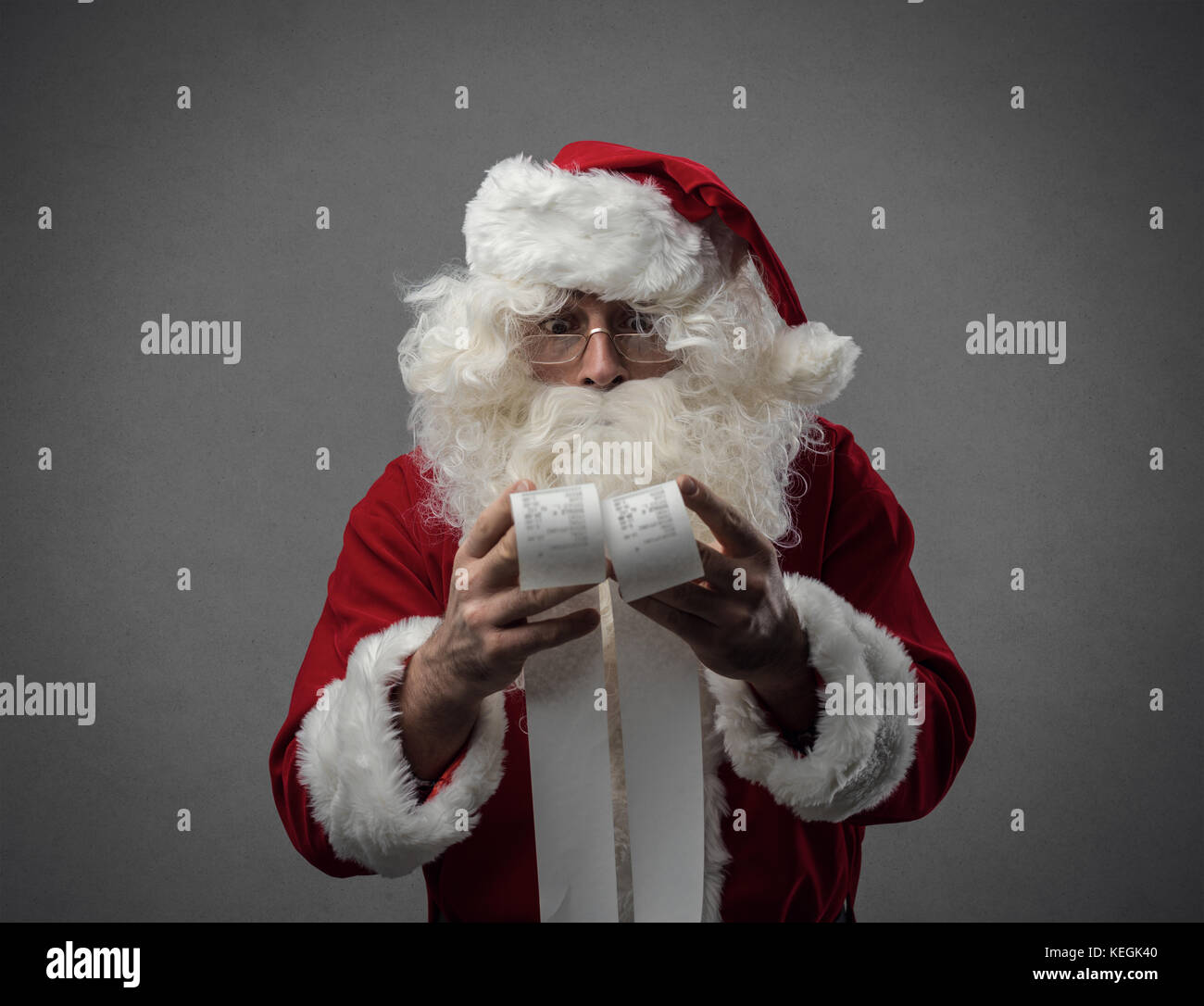 Astonished shocked Santa Claus checking Christmas's shopping expensive ...