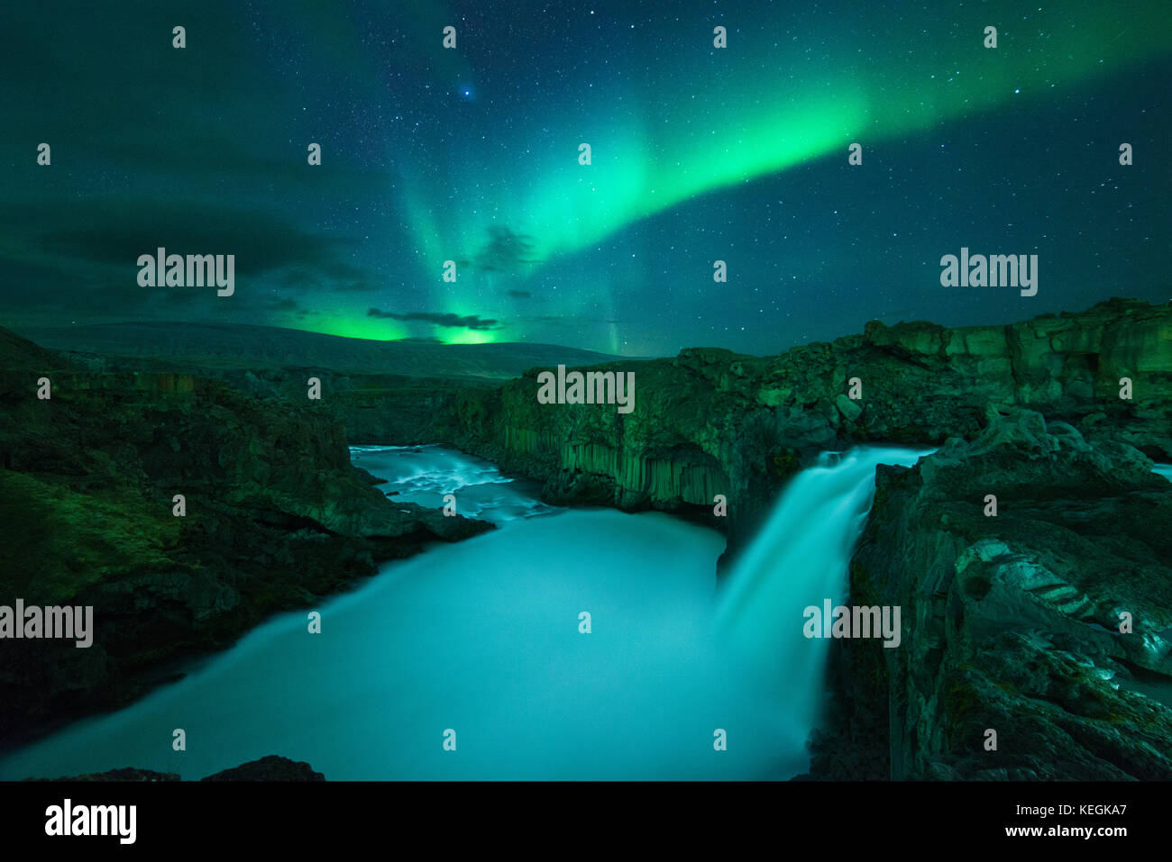 Aldeyjarfoss Waterfall At Night Under The Light Of Aurora Borealis