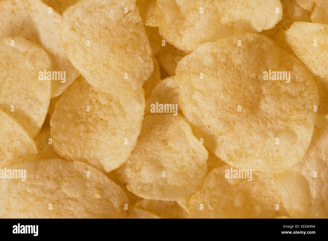 Close up potato chips on wood top view background Stock Photo - Alamy