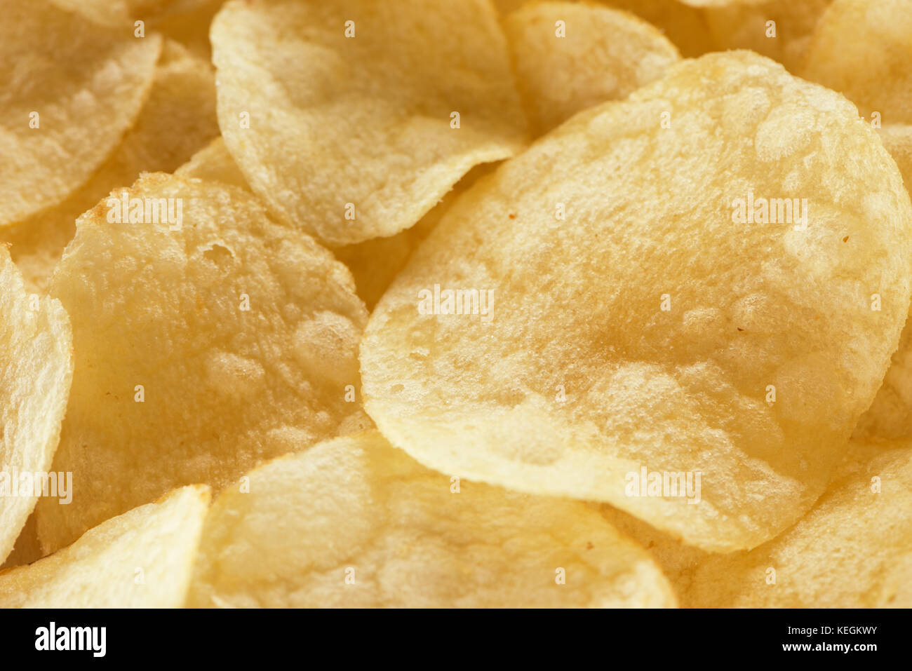 Close up potato chips on wood top view background Stock Photo - Alamy