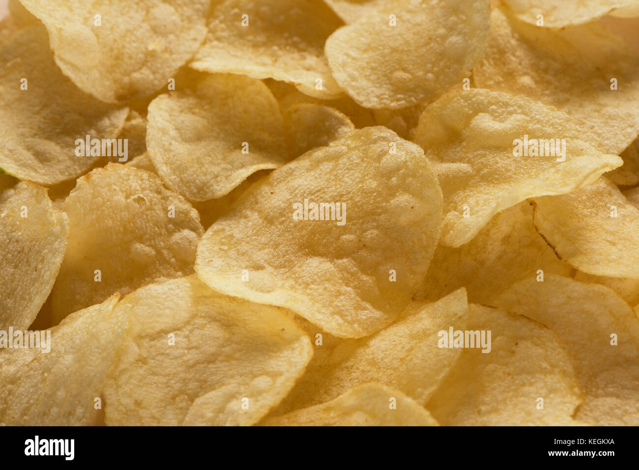 Close up potato chips on wood top view background Stock Photo - Alamy