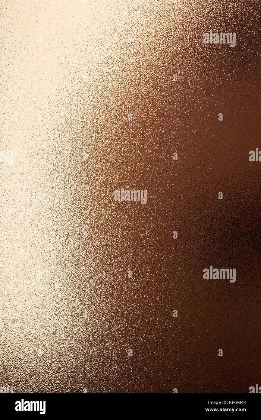 golden reflections on grained texture of a glass surface Stock Photo ...