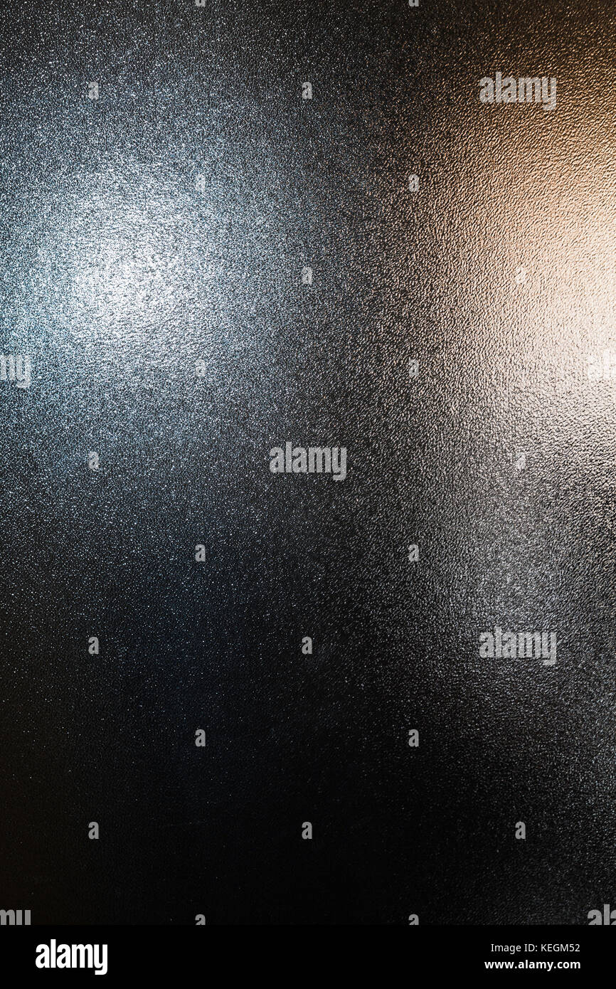 Two lights reflected in grained glass Stock Photo - Alamy