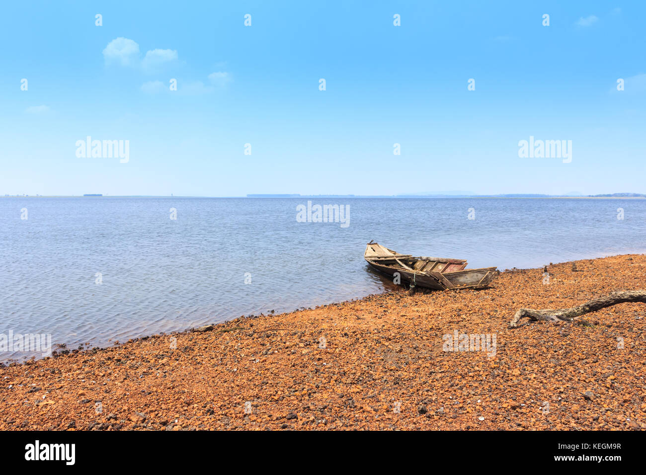 beautiful landscape with wooden boat on the river Stock Photo - Alamy