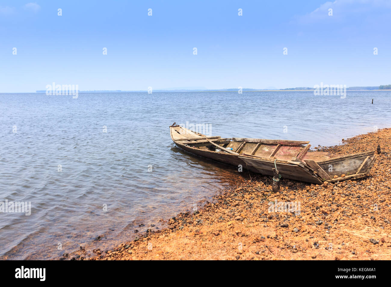 beautiful landscape with wooden boat on the river Stock Photo - Alamy