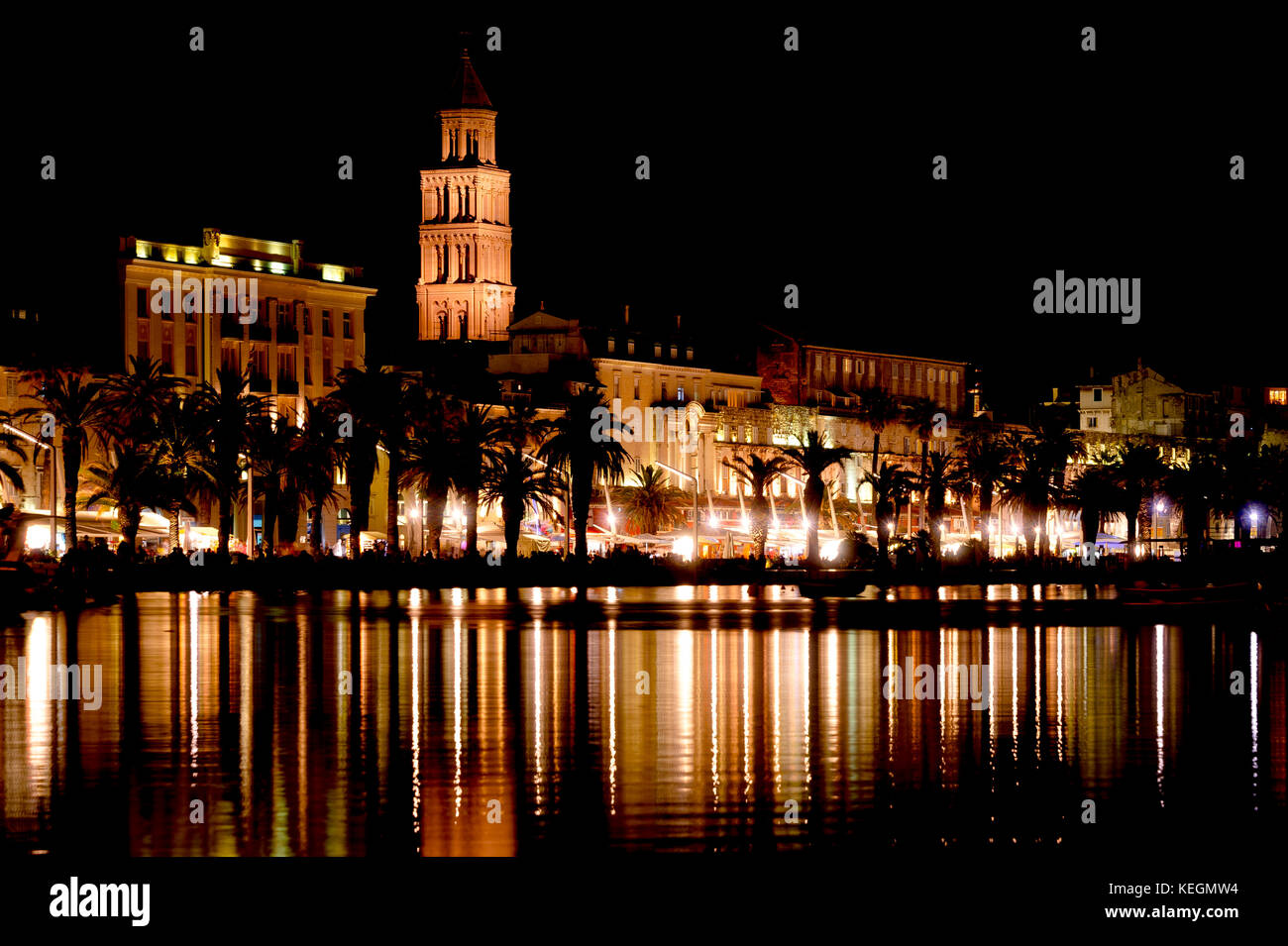 Views of the Riva in Split at night with the lights reflecting on the ...