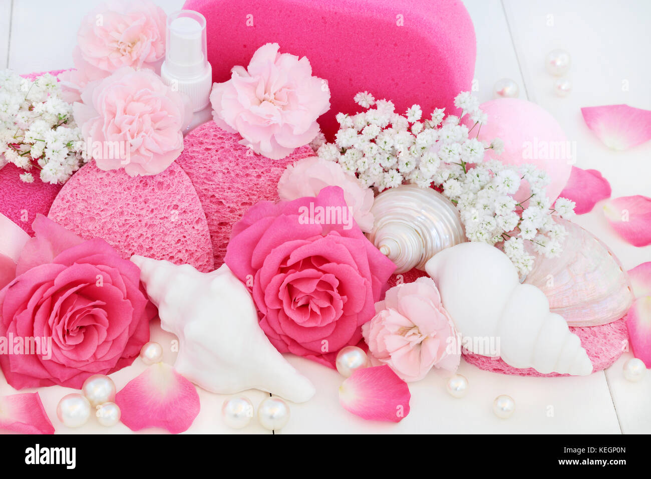 Beauty treatment cleansing and spa products with pink roses and ...