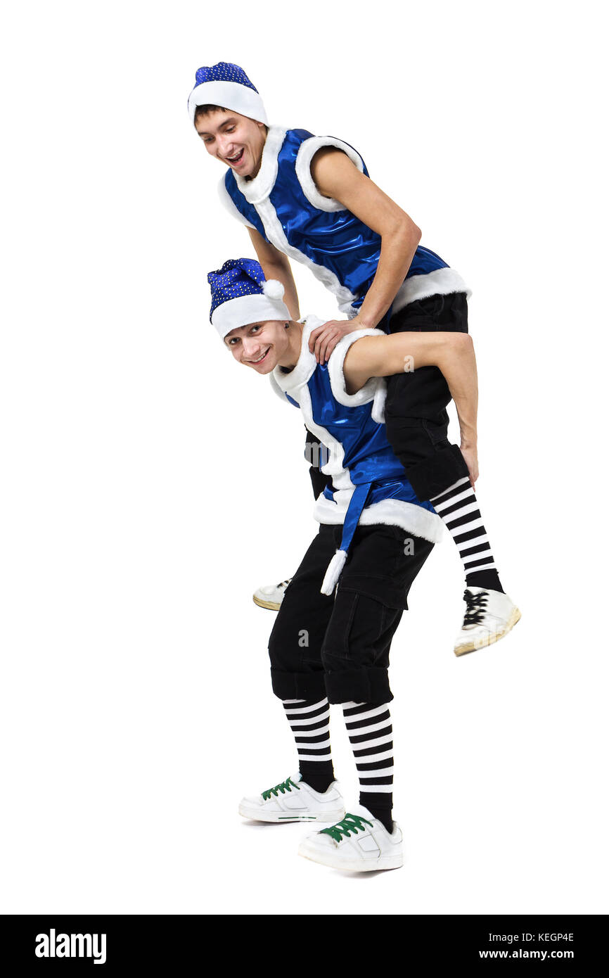 two Christmas men in blue santa clothes dancing against isolated white ...
