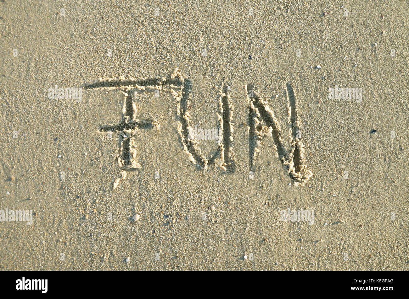 Fun in sand Stock Photo - Alamy