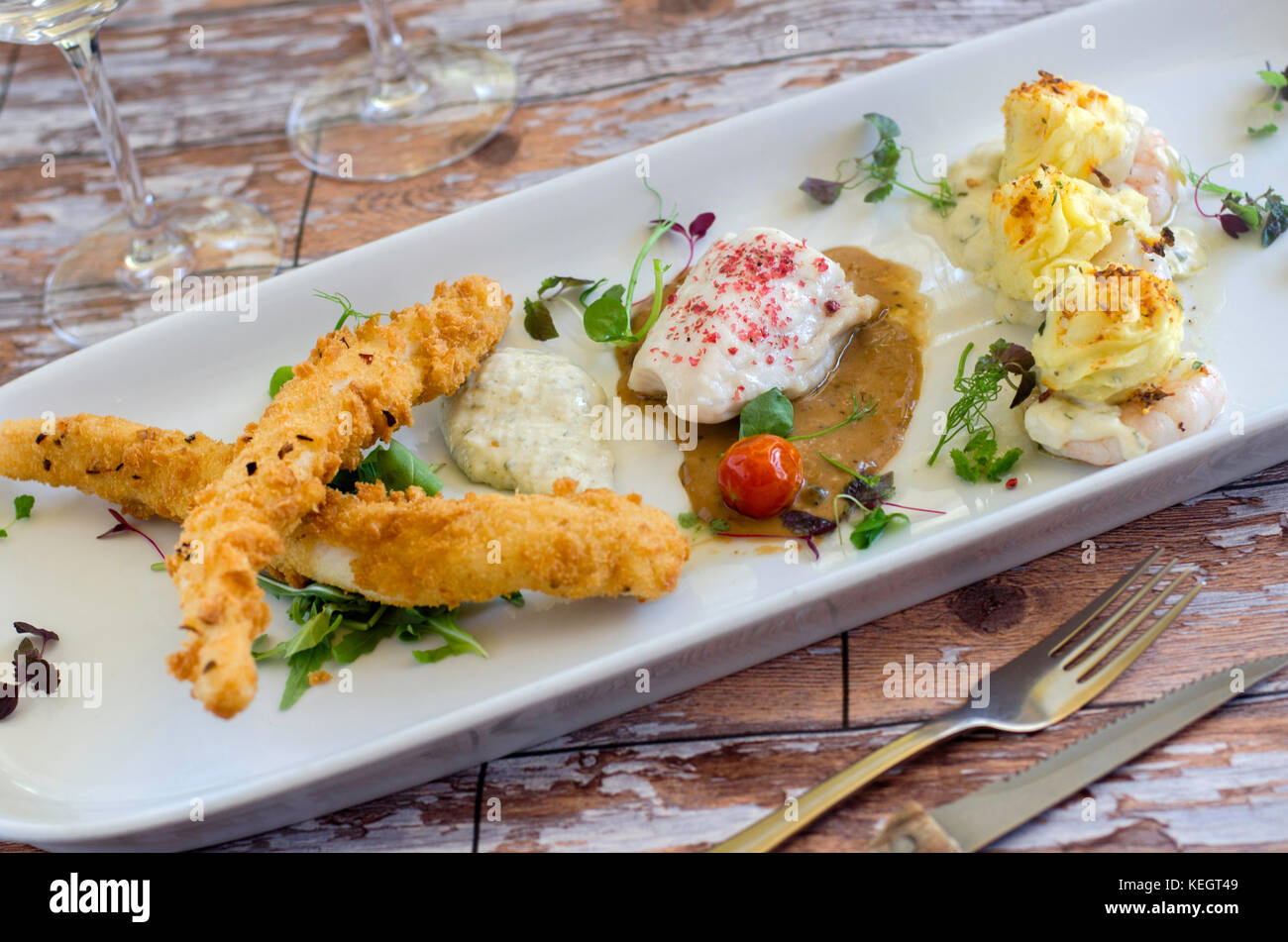 Fish goujons, cod and prawns Stock Photo - Alamy