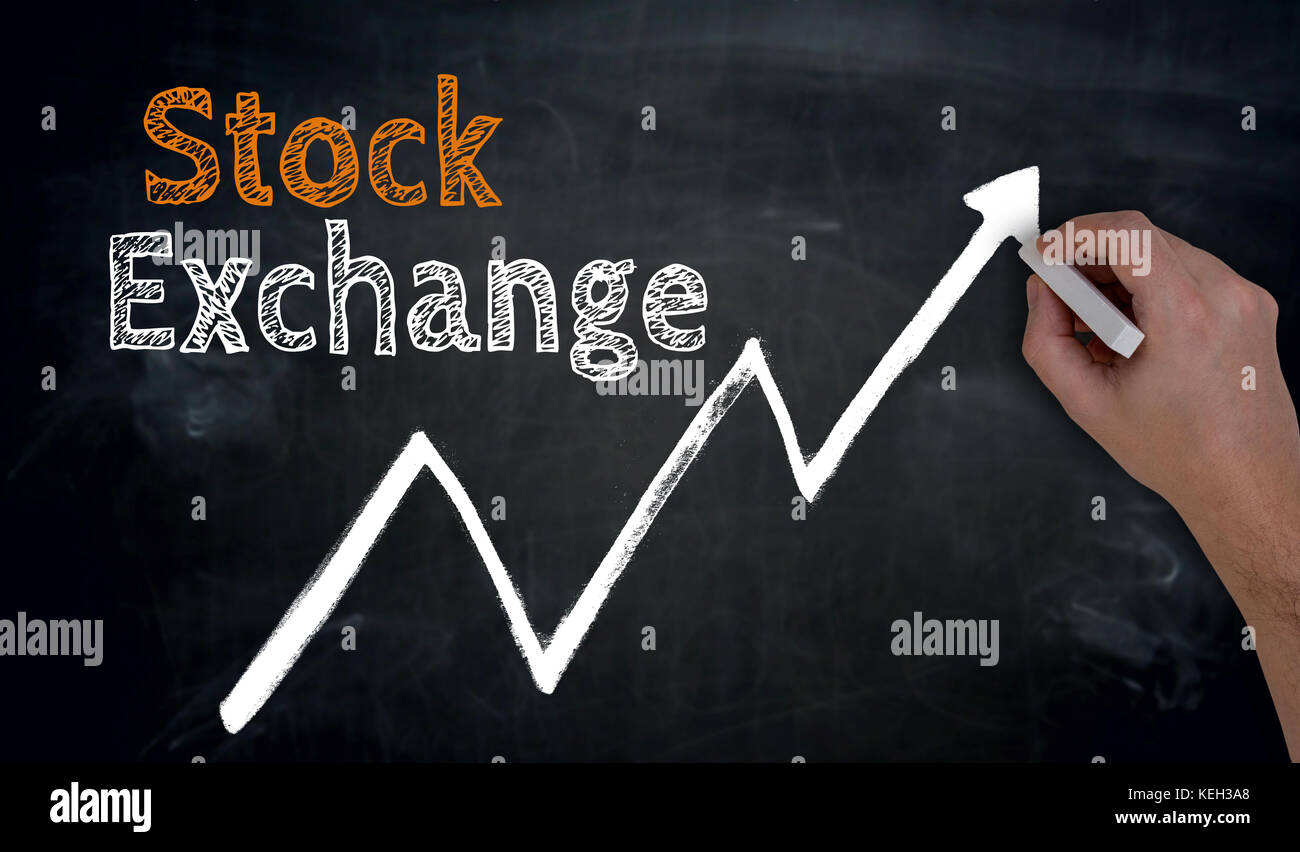 Stock Exchange is written by hand on blackboard Stock Photo - Alamy