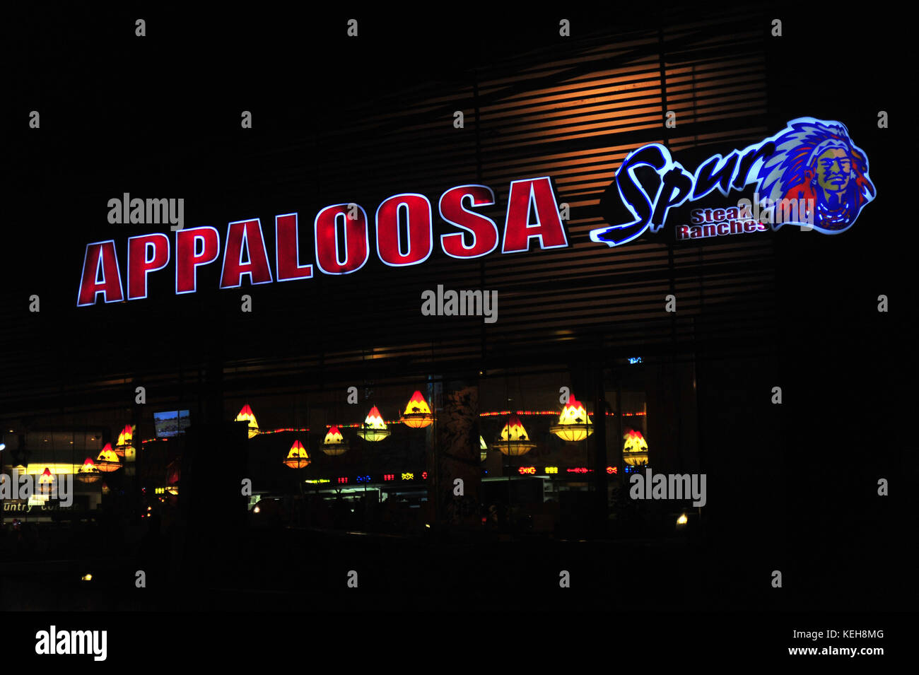 Signs outside South African restaurants at night Stock Photo - Alamy