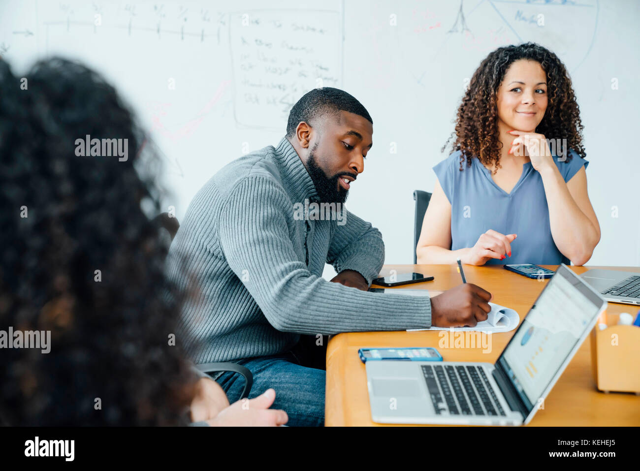 Real business people in meeting hi-res stock photography and images - Alamy