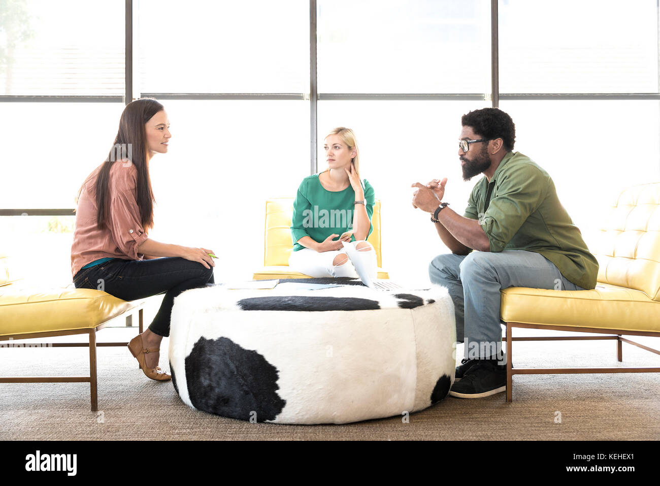 Mid adult man lounge chair hi-res stock photography and images - Alamy