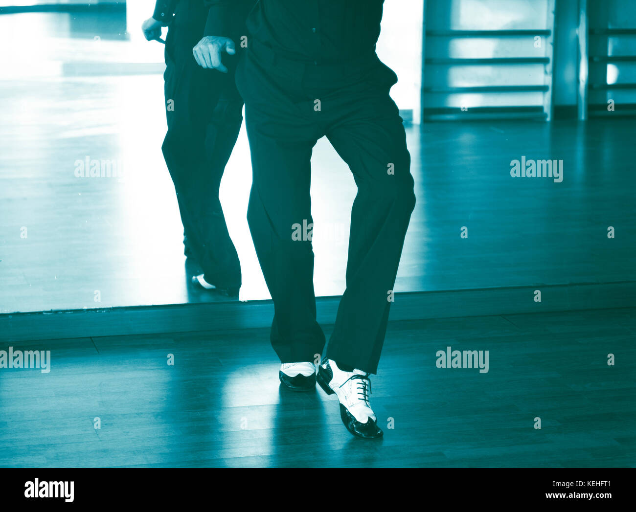 Ballroom dance male dancer and teacher in studio school dancing in ...