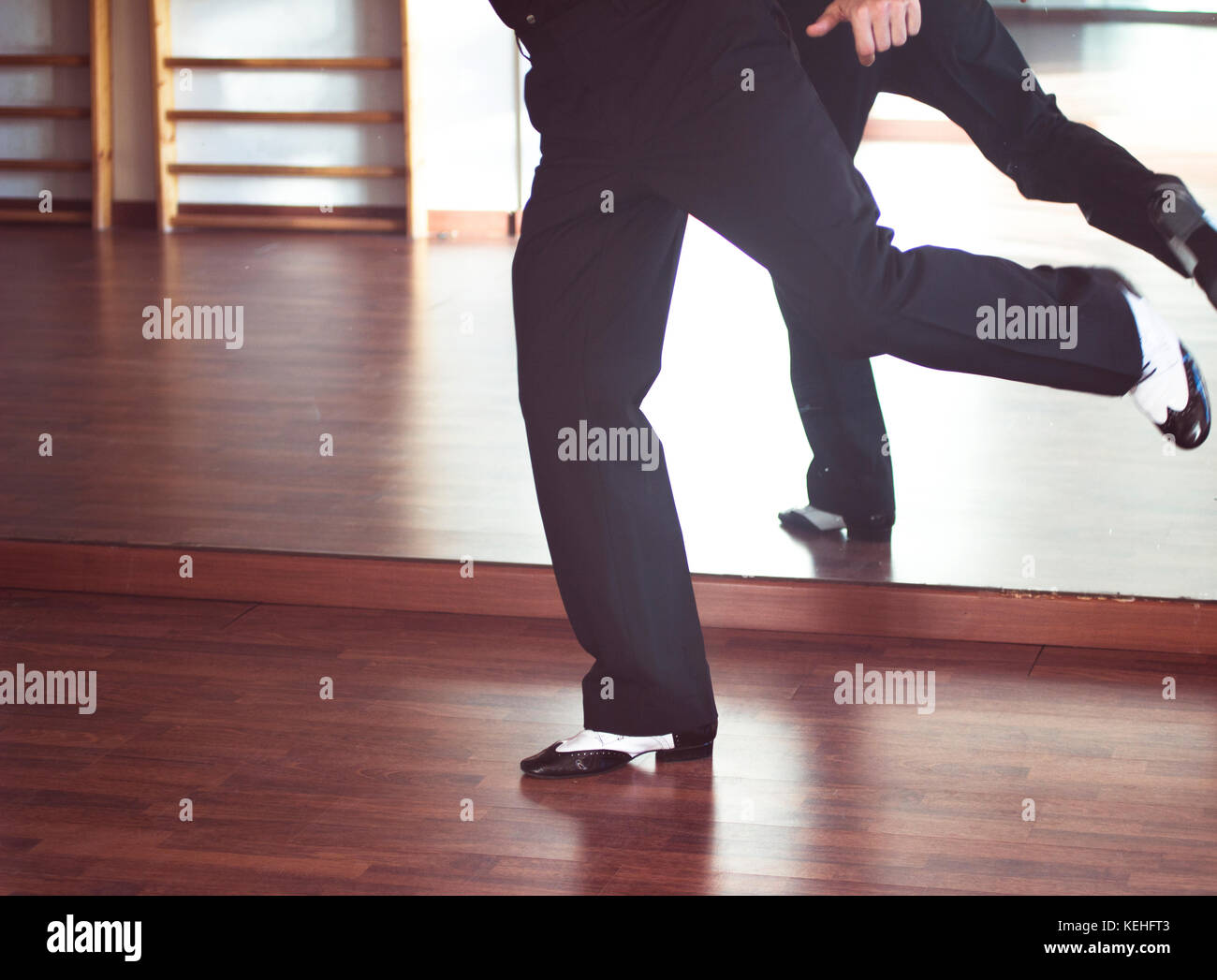 Ballroom dance male dancer and teacher in studio school dancing in ...