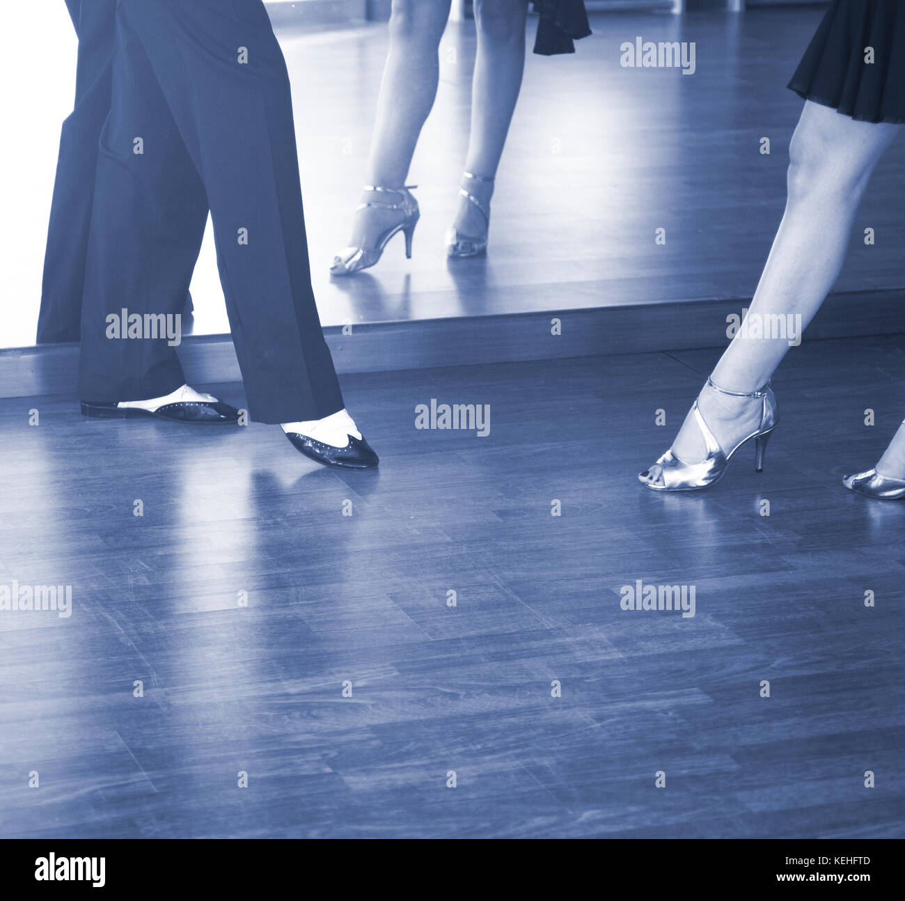 Ballroom dance couple of dancers and teachers in studio school dancing ...