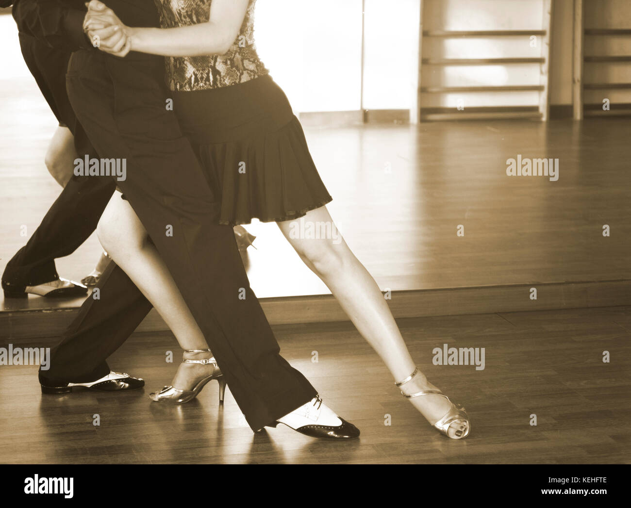Ballroom dance couple of dancers and teachers in studio school dancing ...