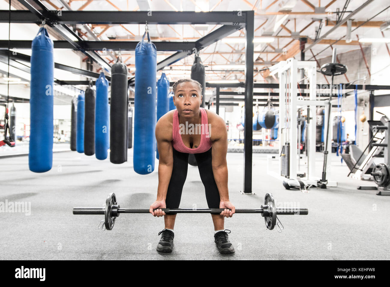 Woman lifting weights african american hi-res stock photography and ...