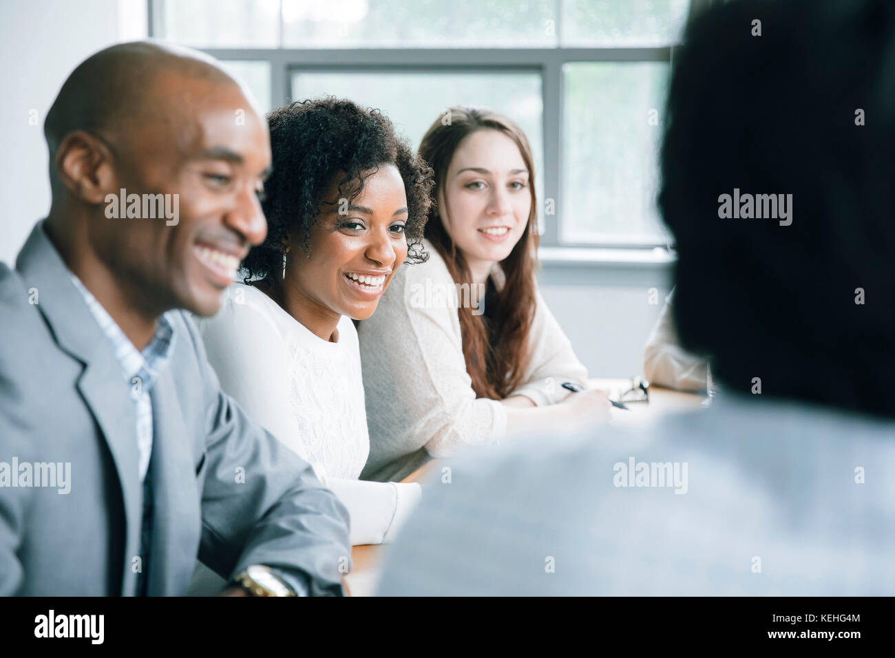 Business people laughing in meeting Stock Photo - Alamy Business people laughing in meeting Stock Photo - Alamy