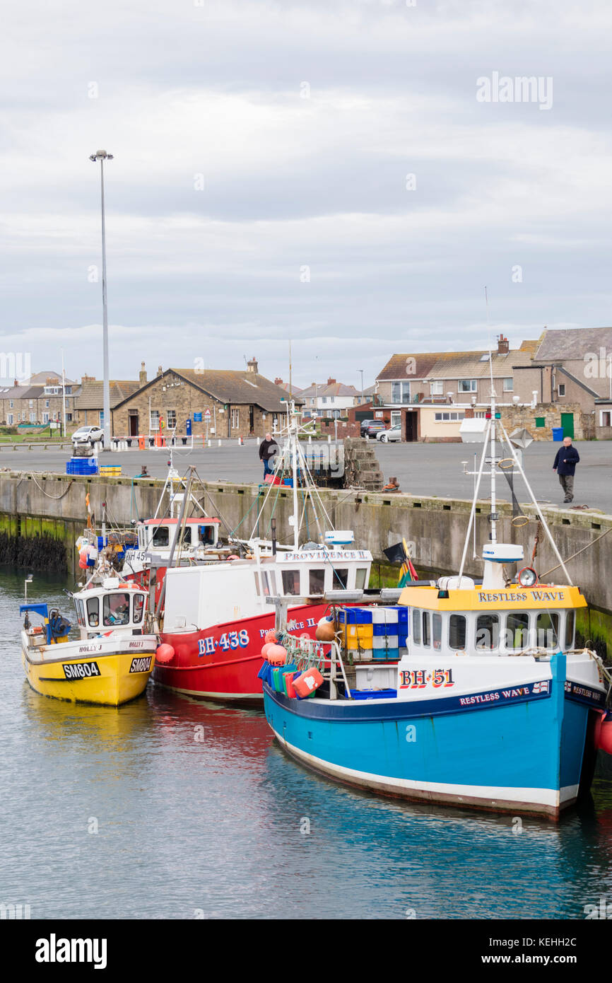 Colourful fishing boats on the River Coquet at Amble, Northumberland ...