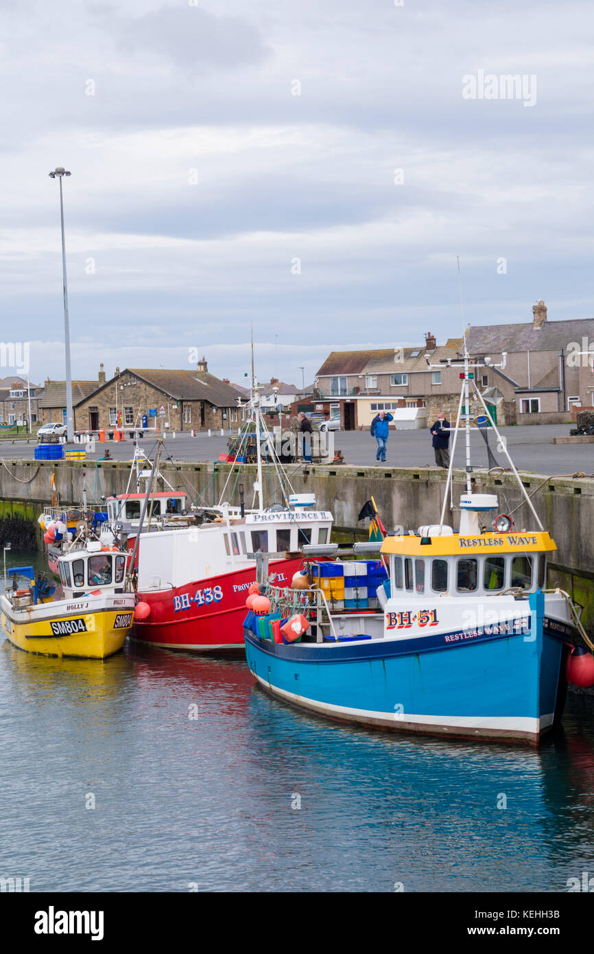 Colourful fishing boats on the River Coquet at Amble, Northumberland ...
