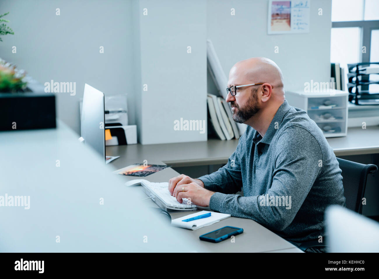 Caucasian businessman using computer Stock Photo - Alamy