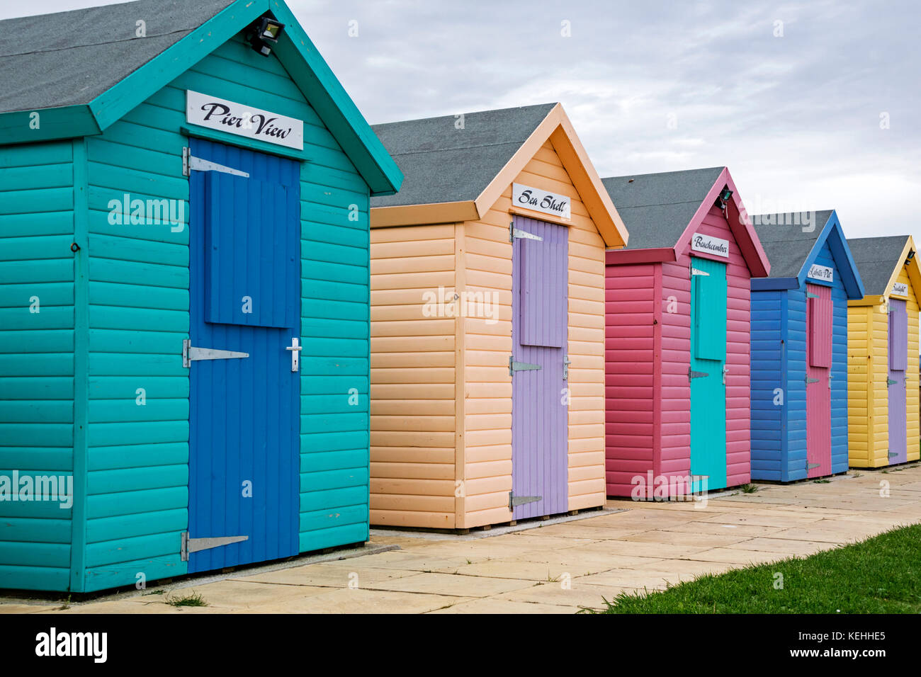 Colourful beach huts, Amble, Northumberland, England, UK Stock Photo ...