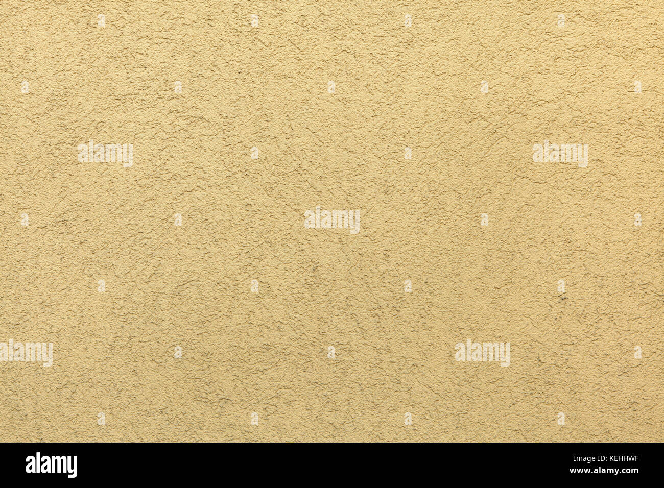 Yellow painted stucco wall. Background texture Stock Photo - Alamy