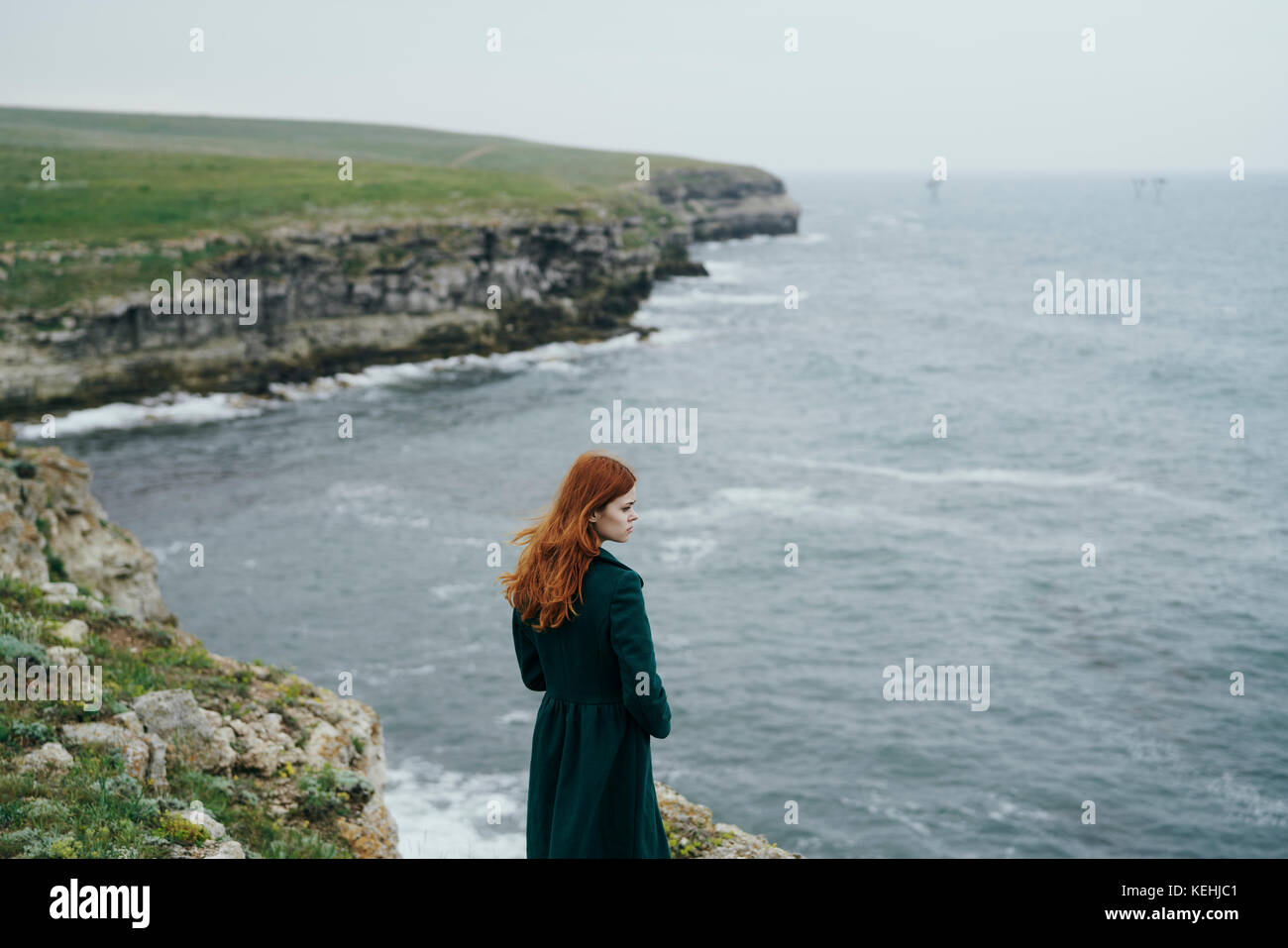 Caucasian woman standing watching camera hi-res stock photography and ...